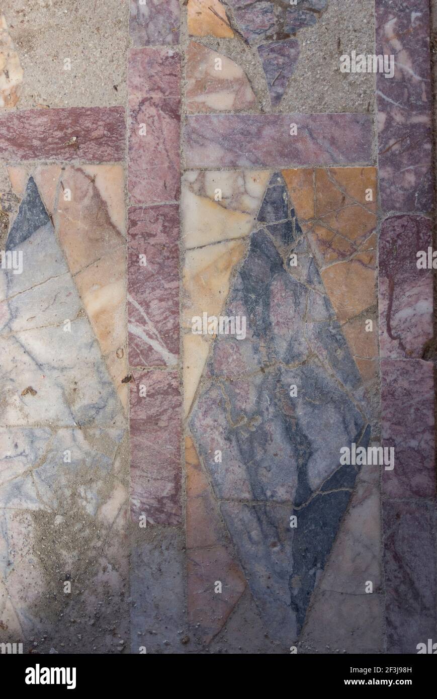 Ancient Roman marble wall decoration at the ruins of Herculaneum ...