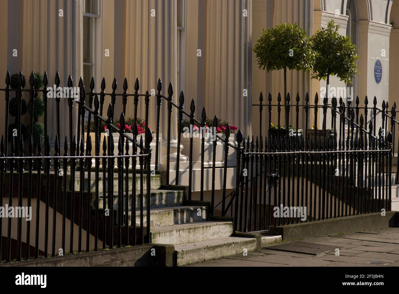 Neo-classical columns and iron gates of one of the houses of Chester ...