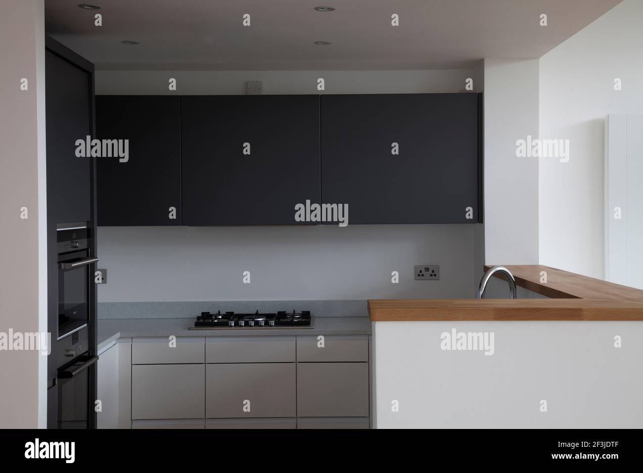 Open kitchen units in Modern Apartments, Hampton Wick Stock Photo - Alamy