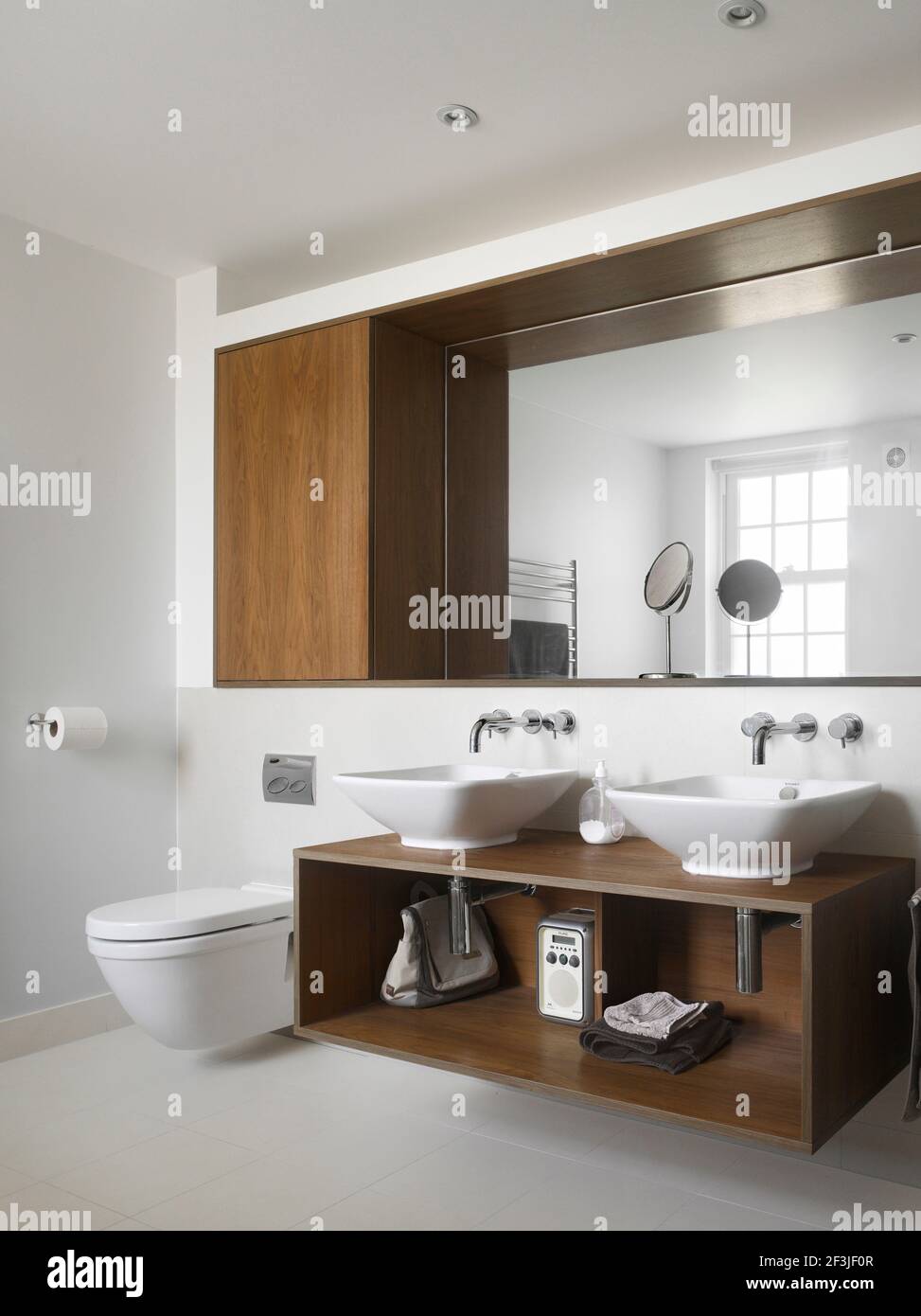 Two washbasins on unit in modern bathroom Stock Photo - Alamy