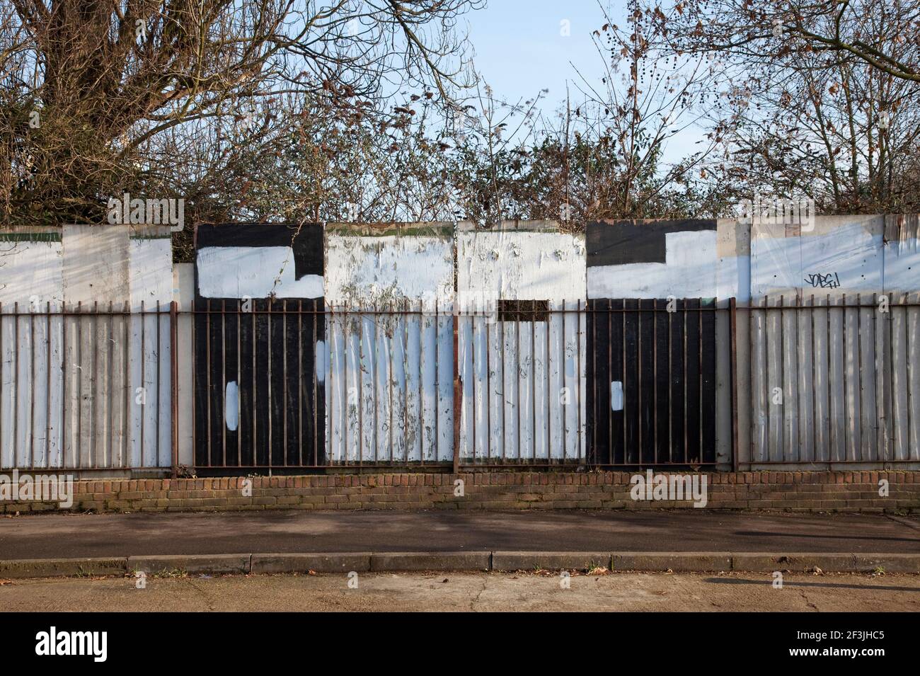 Pavement, railings and boarding Stock Photo - Alamy