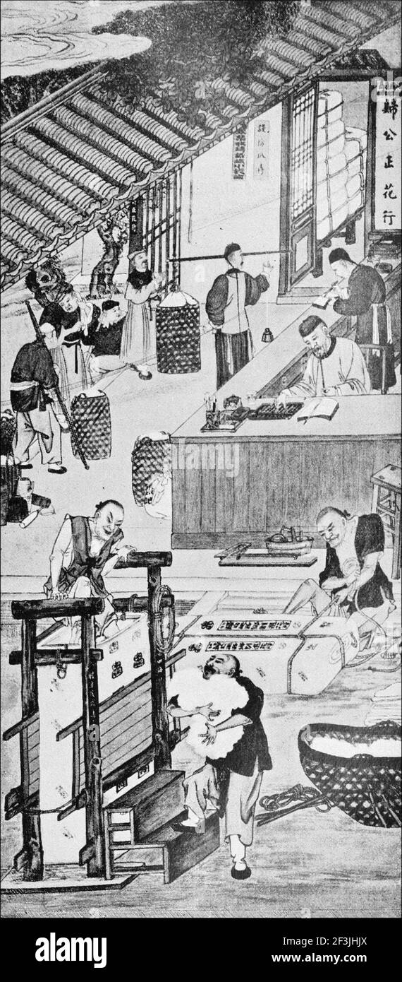 Baling and pressing cotton Stock Photo - Alamy