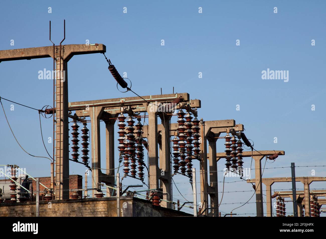 Electricity sub station pylons Stock Photo - Alamy