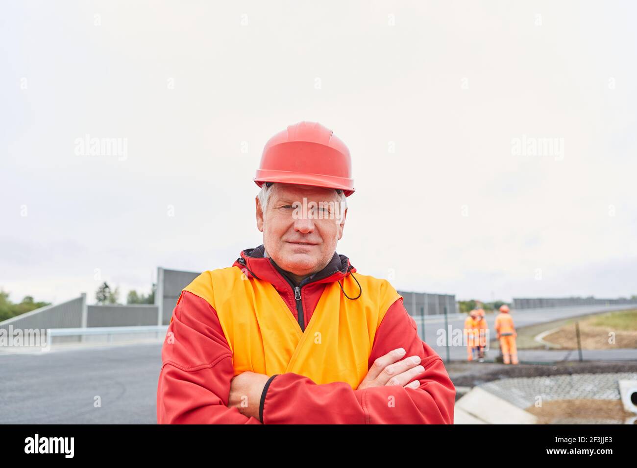 Man as a construction manager or architect with experience of road ...
