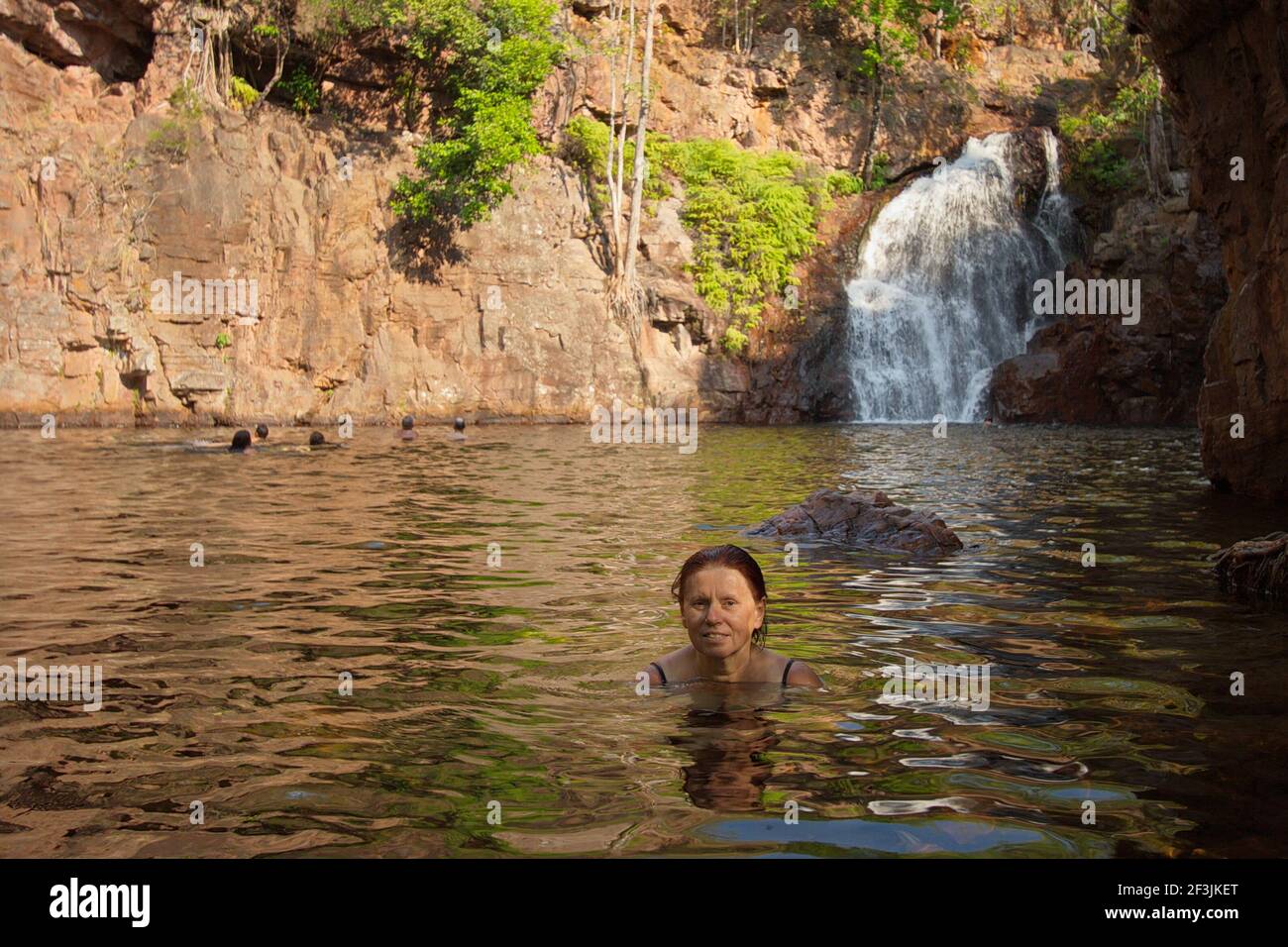 Woman bathing in waterfall hi-res stock photography and images - Alamy
