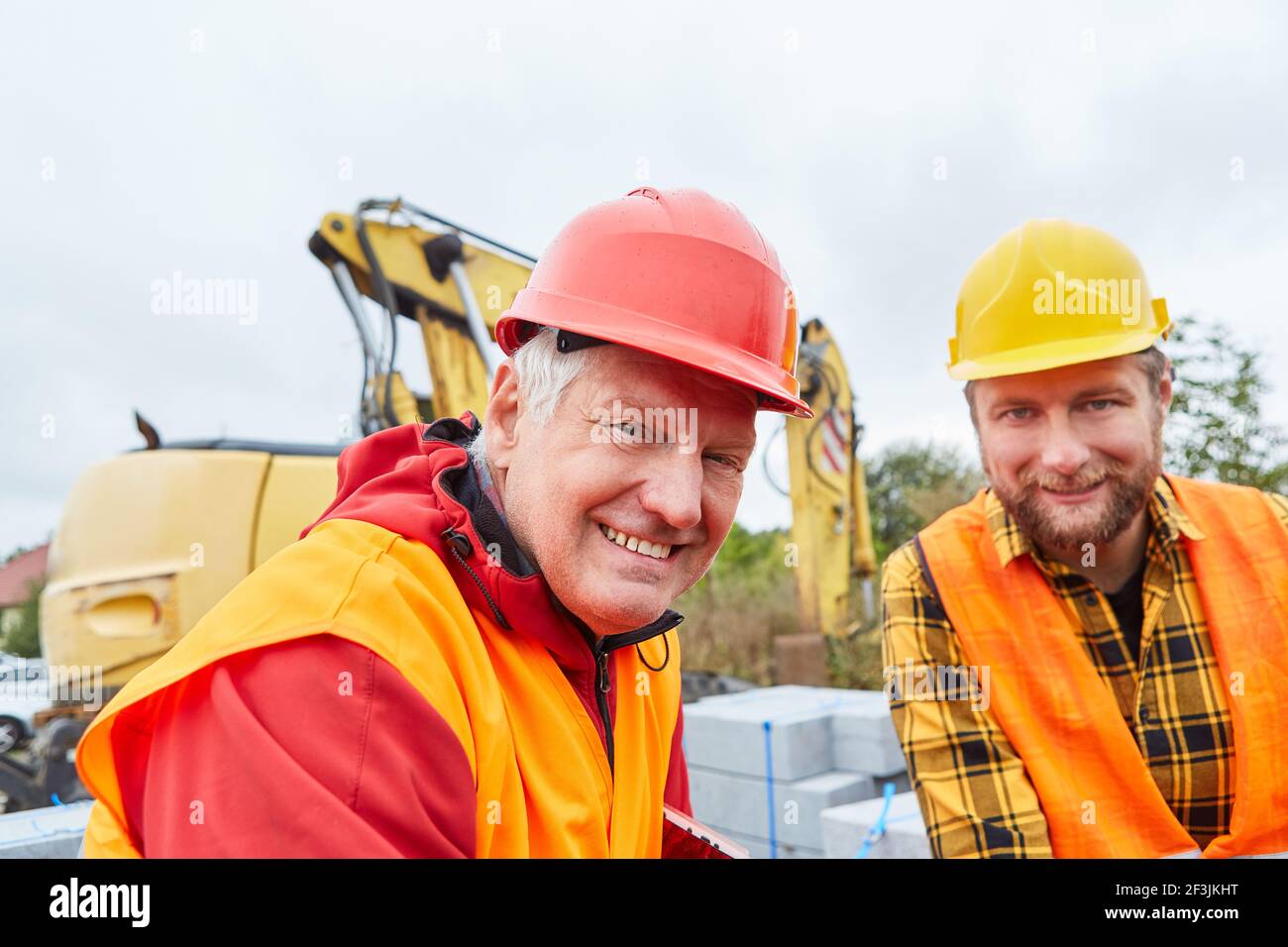 Construction worker smiling on site hi-res stock photography and images ...