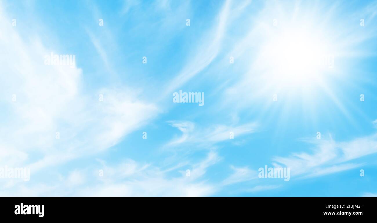 Blue sky with light clouds and bright sun. Summer sky backdrop Stock ...
