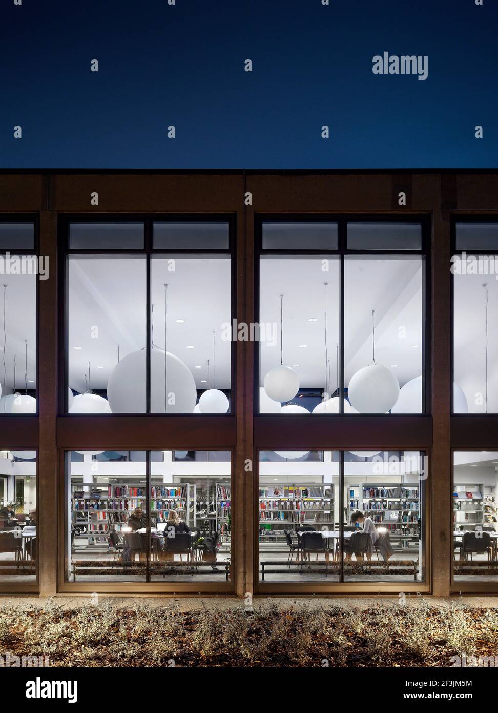 View through windows to students in library, Fielden Campus, West ...