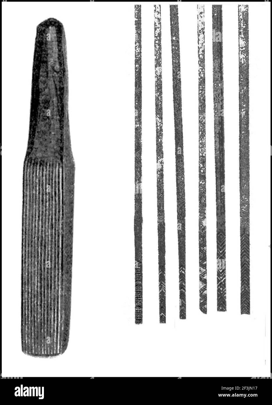 Cloth beating club and cloth pattern sticks from Hawaii Stock Photo - Alamy