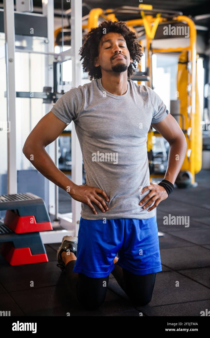Fitness man tired relaxed after workout exercise Stock Photo - Alamy