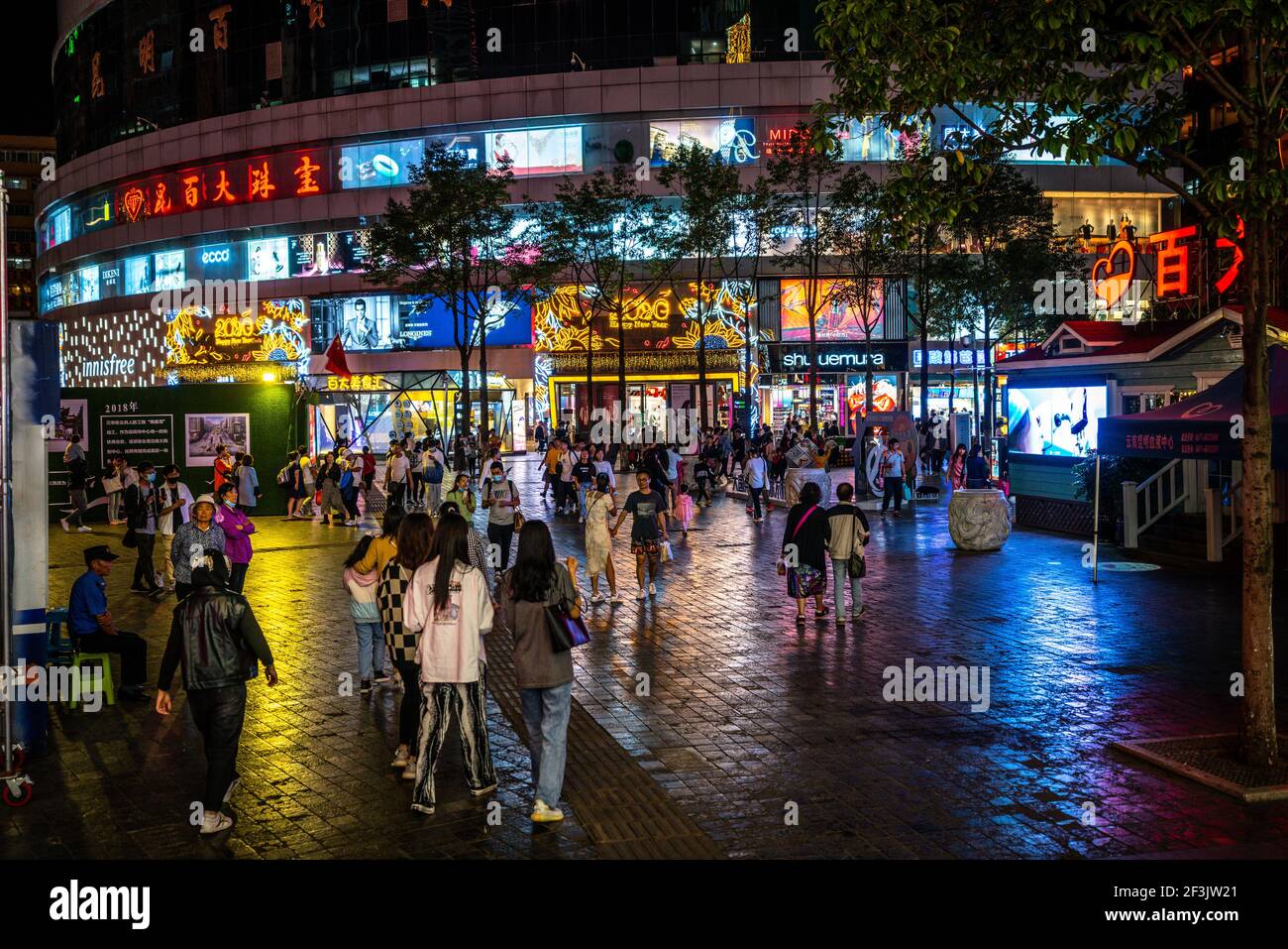 Kunming China , 3 October 2020 : People and shopping mall view at night ...