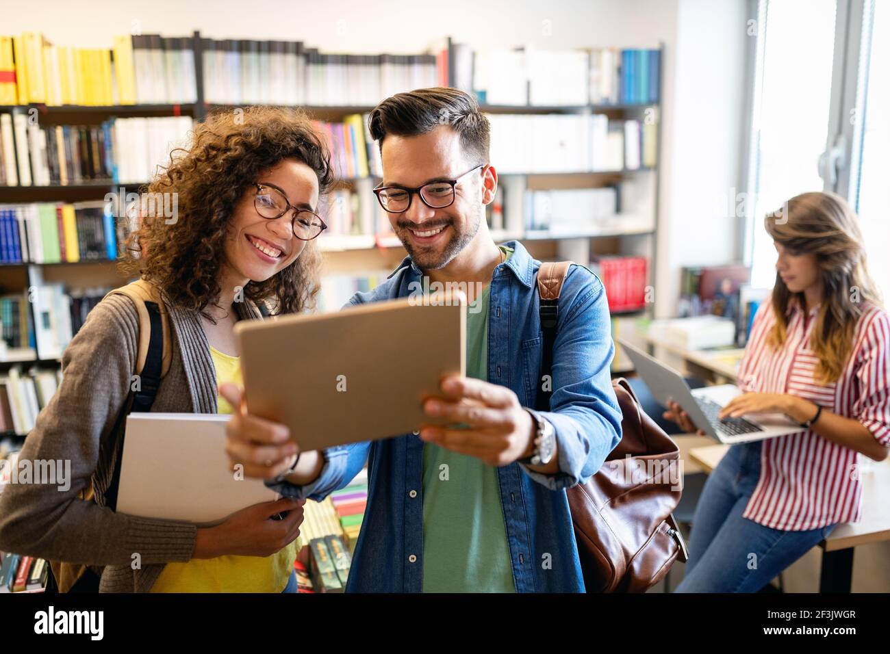 Group of students study at library. Learning and preparing for ...