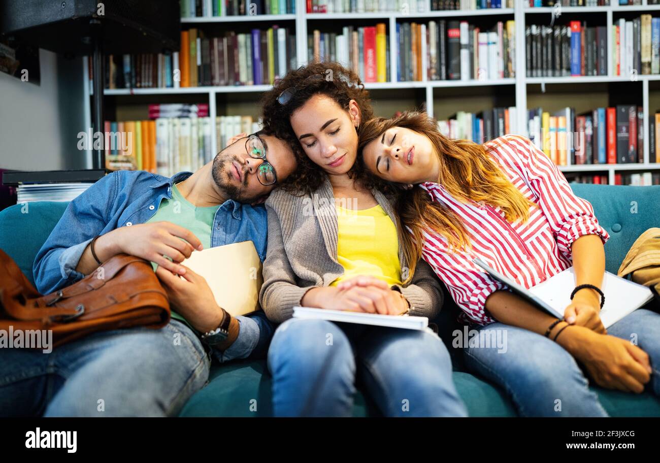 College, study, university and education concept. Group of tired ...