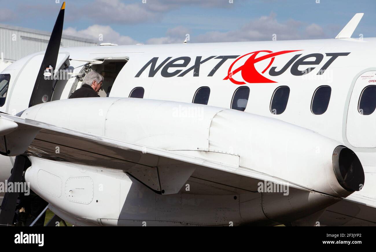 Passengers boarding NextJet's aircraft at Linköping City Airport Stock ...