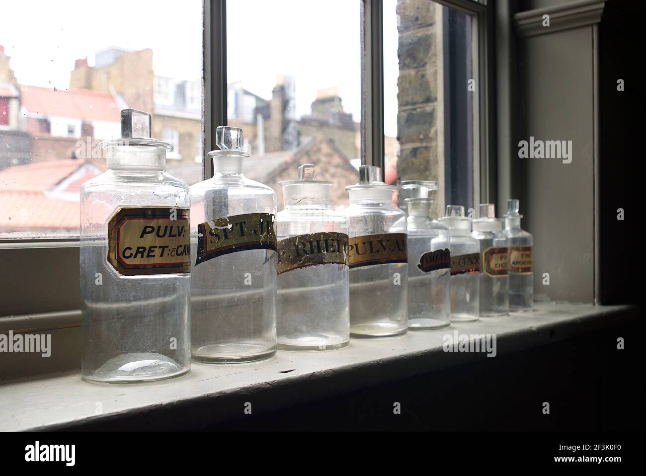 Old bottles window display hi-res stock photography and images - Alamy