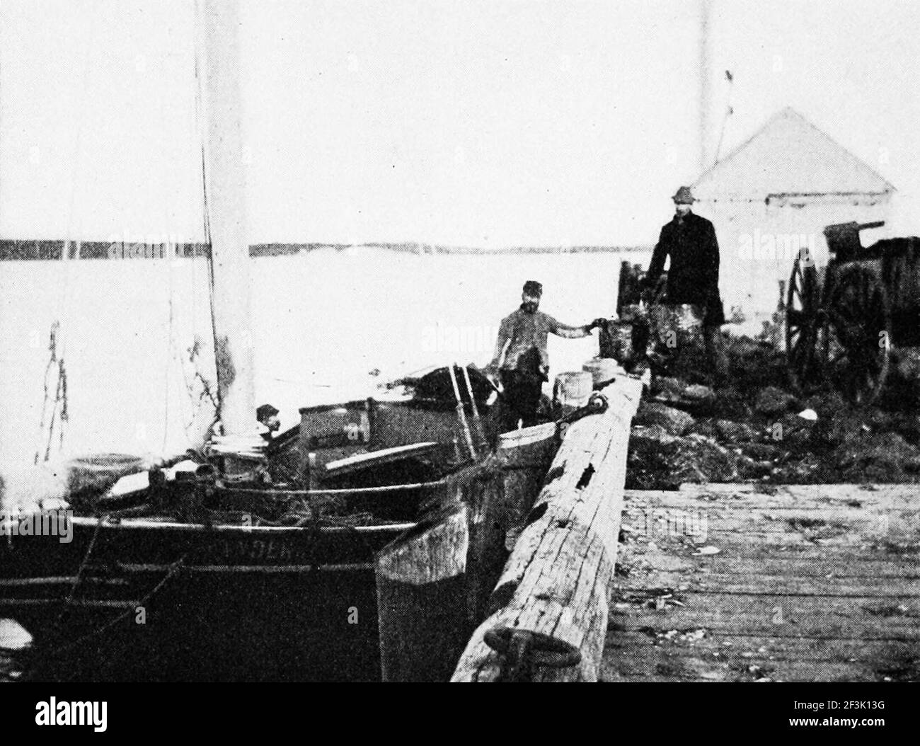 Loading a wagon Stock Photo - Alamy