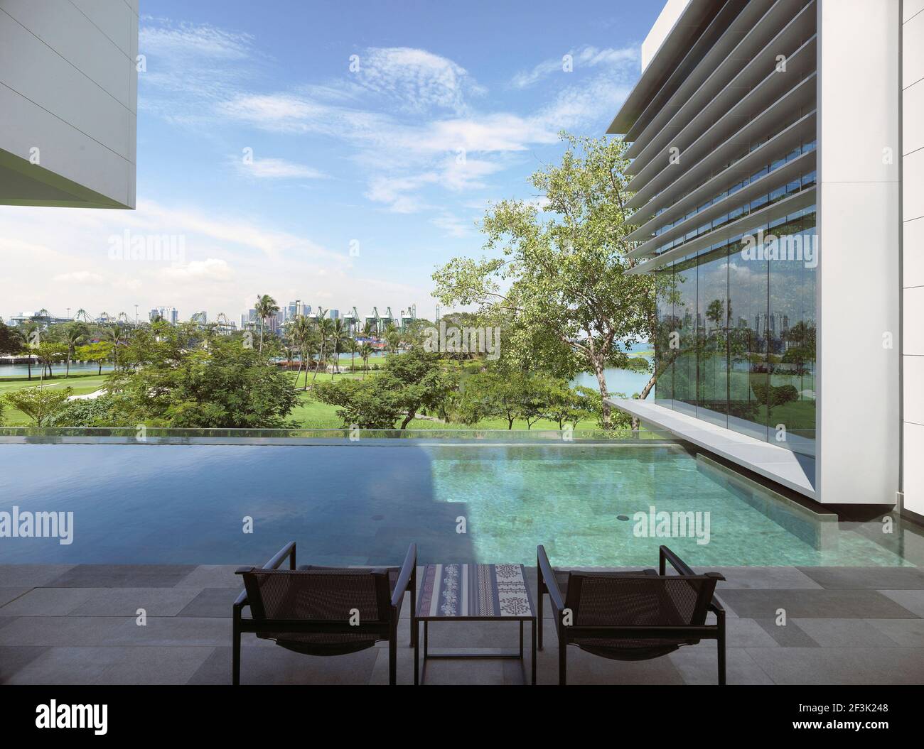 Seating beside swimming pool, Lakeshore View, Sentosa Cove, Singapore ...