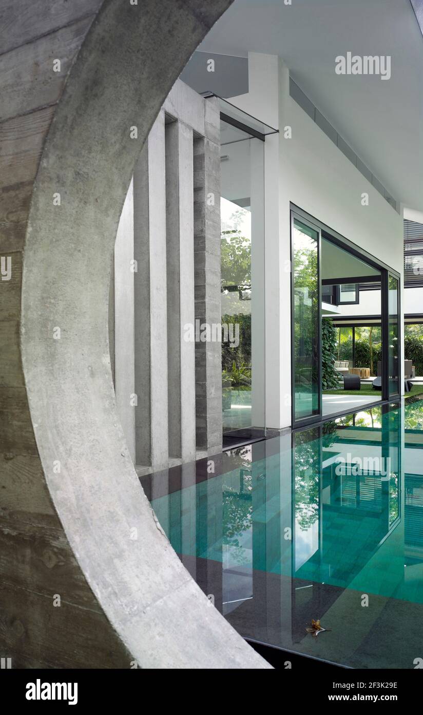Curved water feature in modern House, Swiss Club Road, Singapore Stock ...