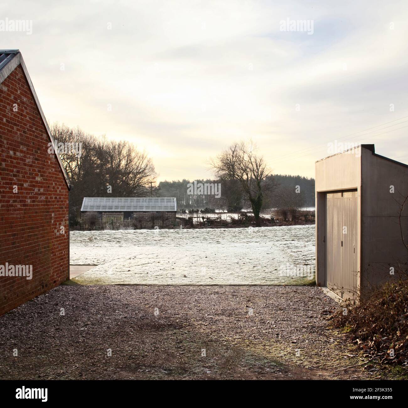 Parking layby and opening threshold created by two parts to scheme of ...