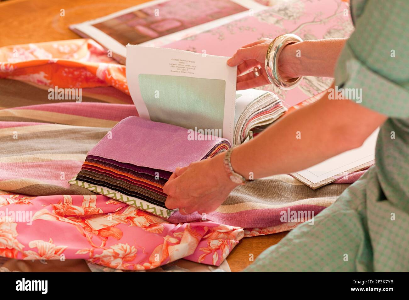 Choosing fabrics. Picture shows swatches of fabric for an interior ...