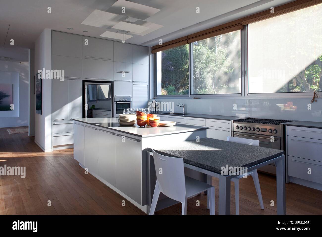 Open plan, sunlit kitchen in L House, Israel, Middle East Stock Photo ...