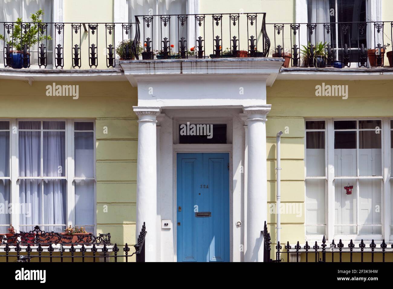 Front facade of terrace house in Chalcot Crescent featuring a portico ...