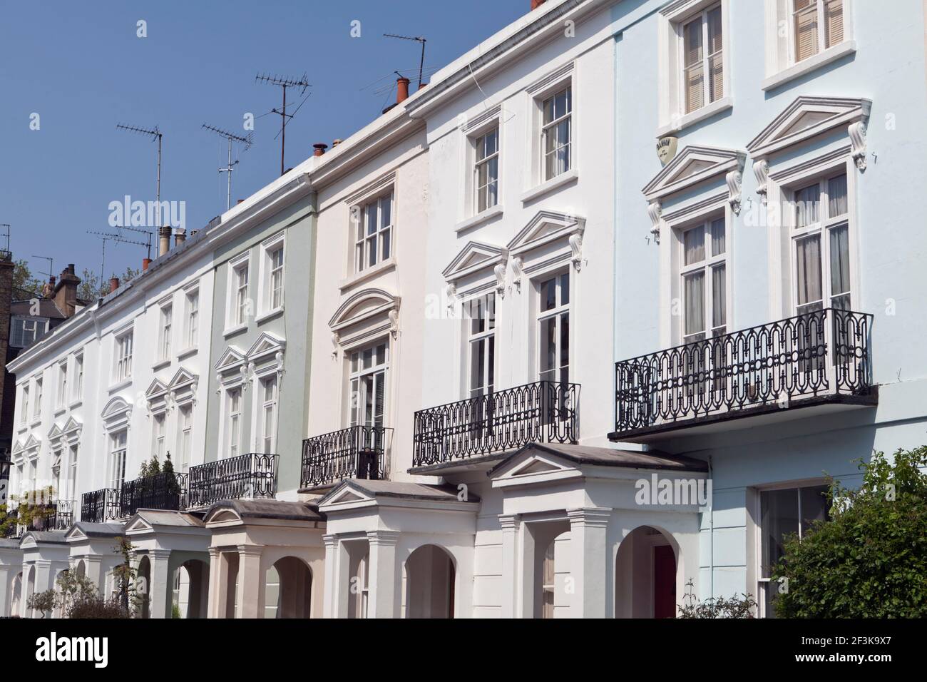 Italianate style terrace houses featuring ornate balconies and ...