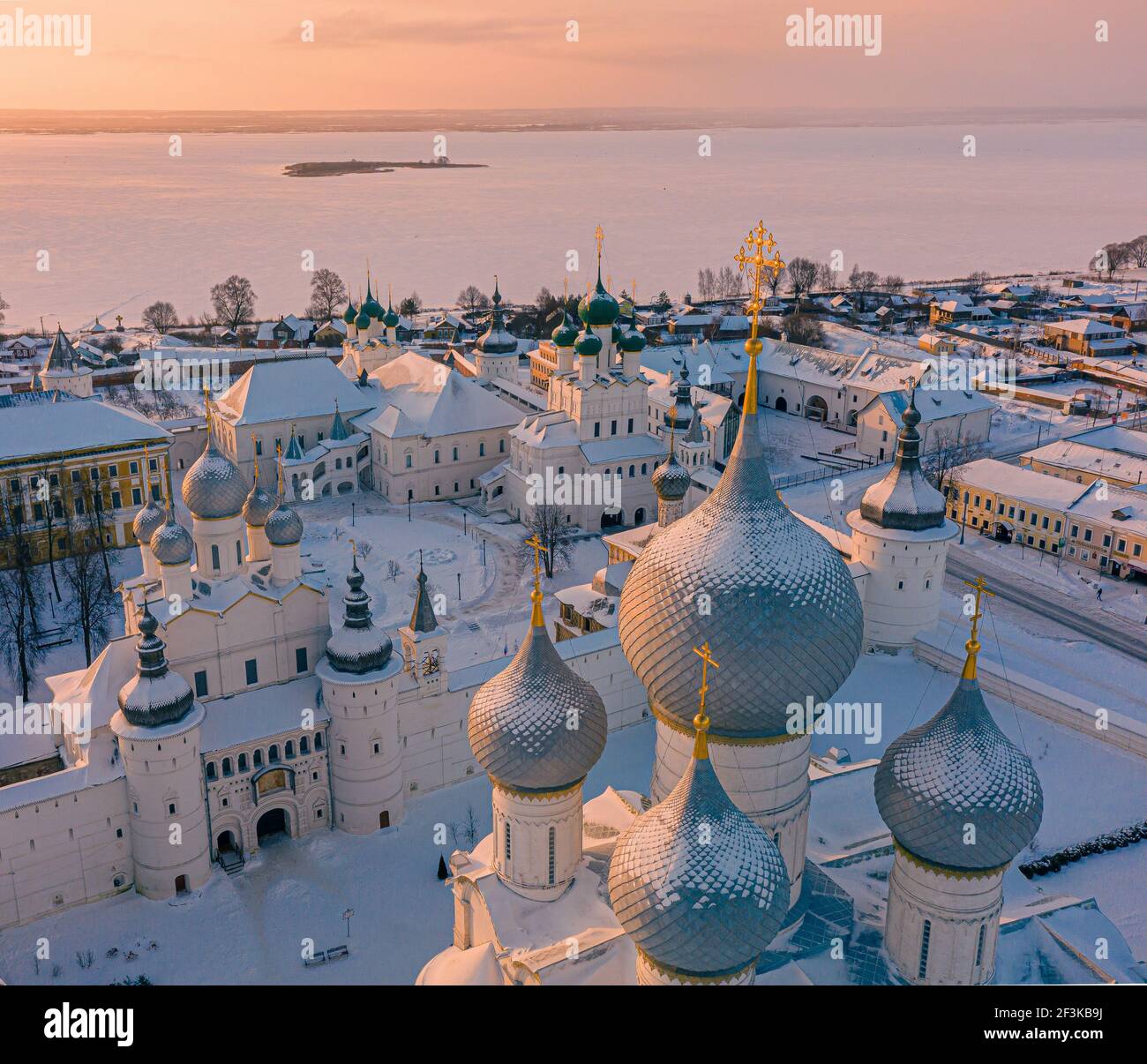 An amazing view of church domes with golden crosses during sunset in ...