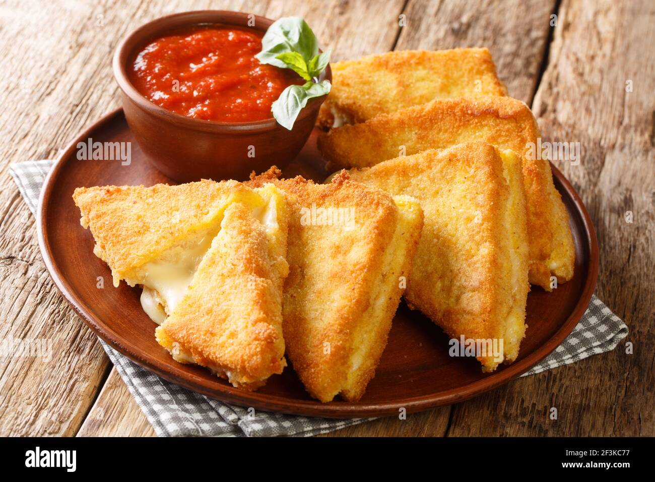 Mozzarella in Carrozza sandwich gets an extra dose of richness from a ...
