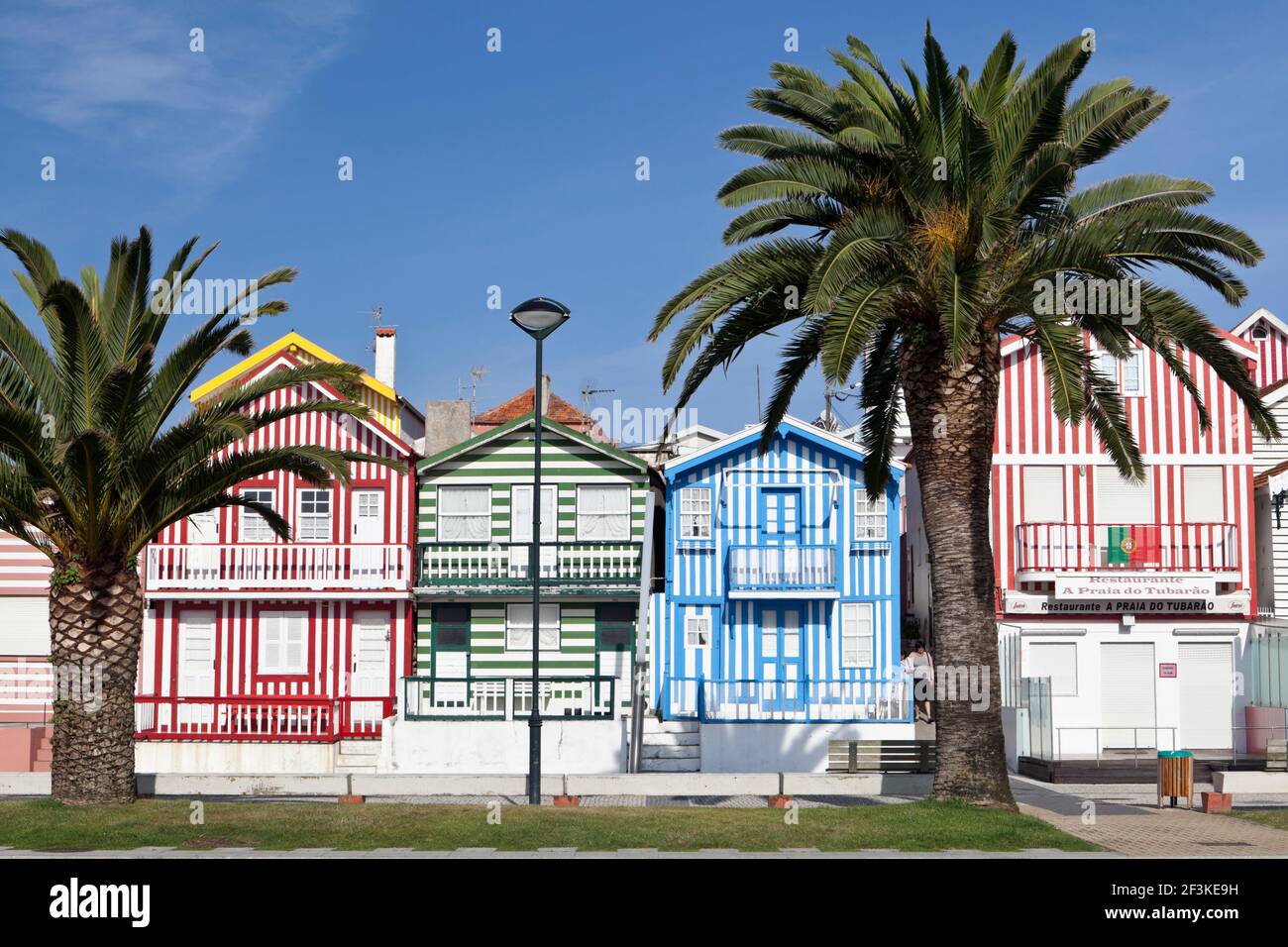 Candy-striped painted fisherman houses in Costa Nova, Beira Litoral ...