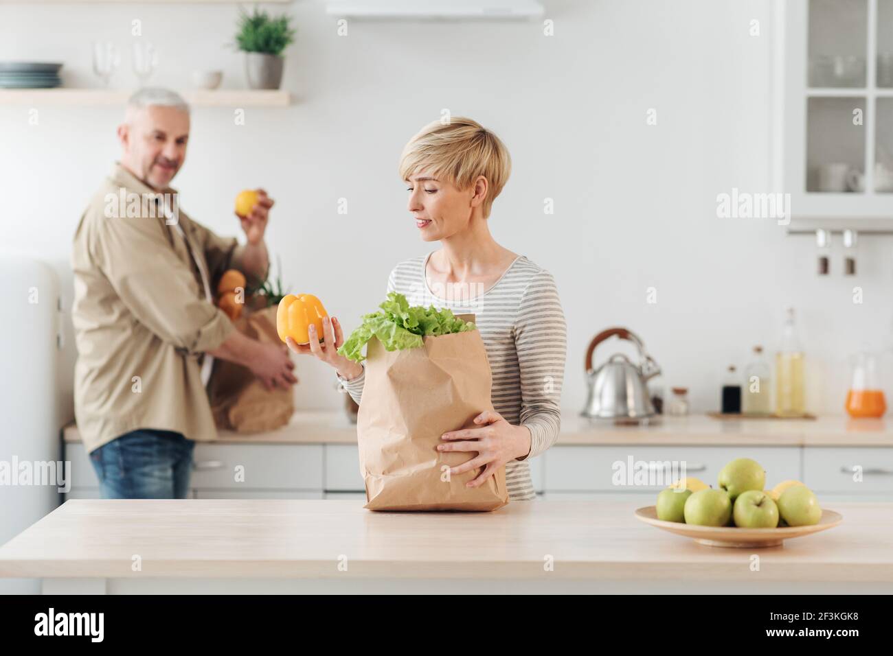 Cooking dinner for family and shopping groceries for home, healthy ...