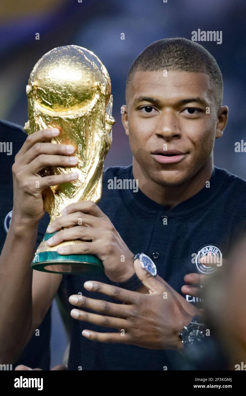 PSG Kylian Mbappe holds the world cup trophy prior to the French ...