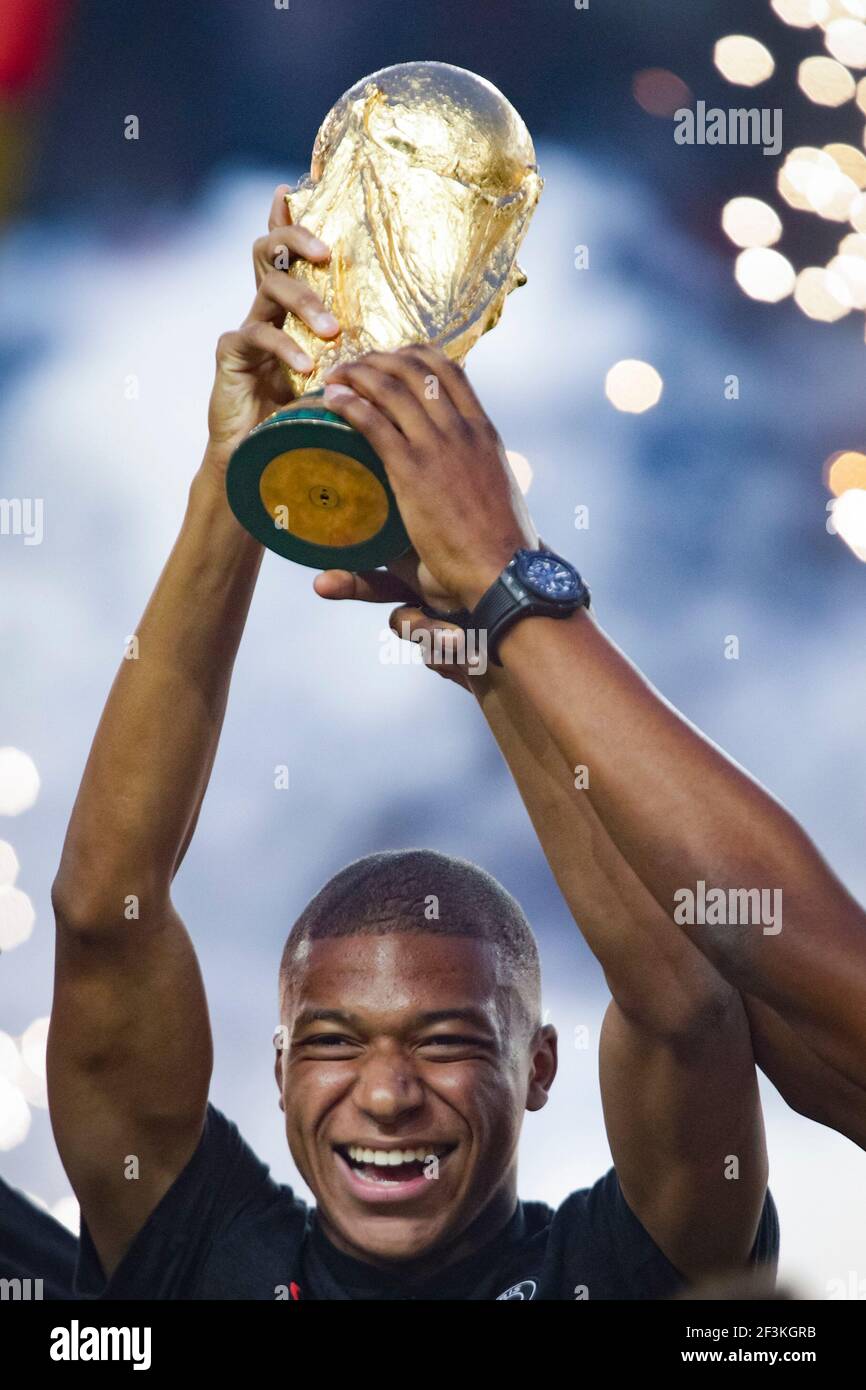 PSG Kylian Mbappe holds the world cup trophy prior to the French ...