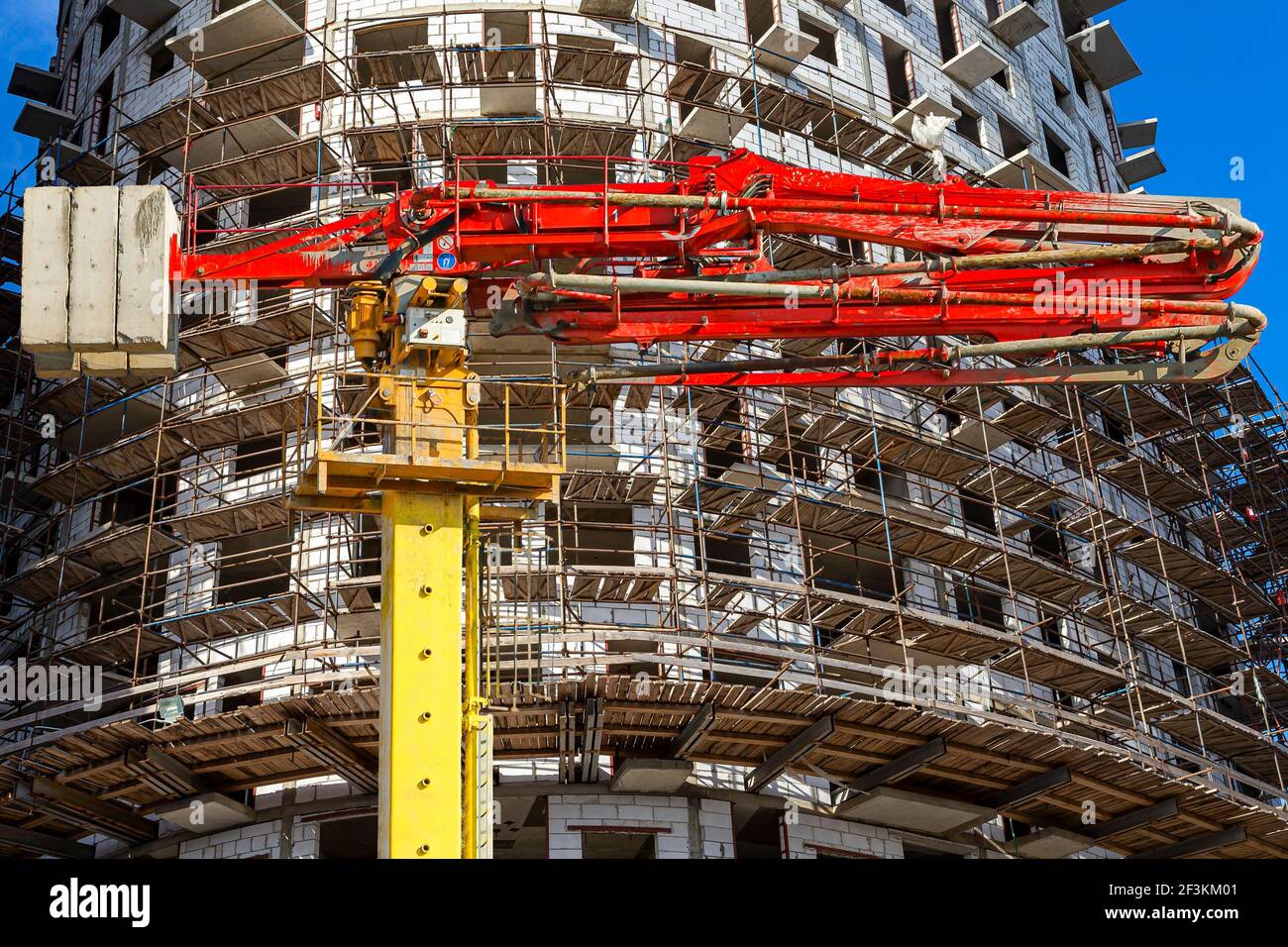Construction concrete pump (pump truck) with multi-storey building ...
