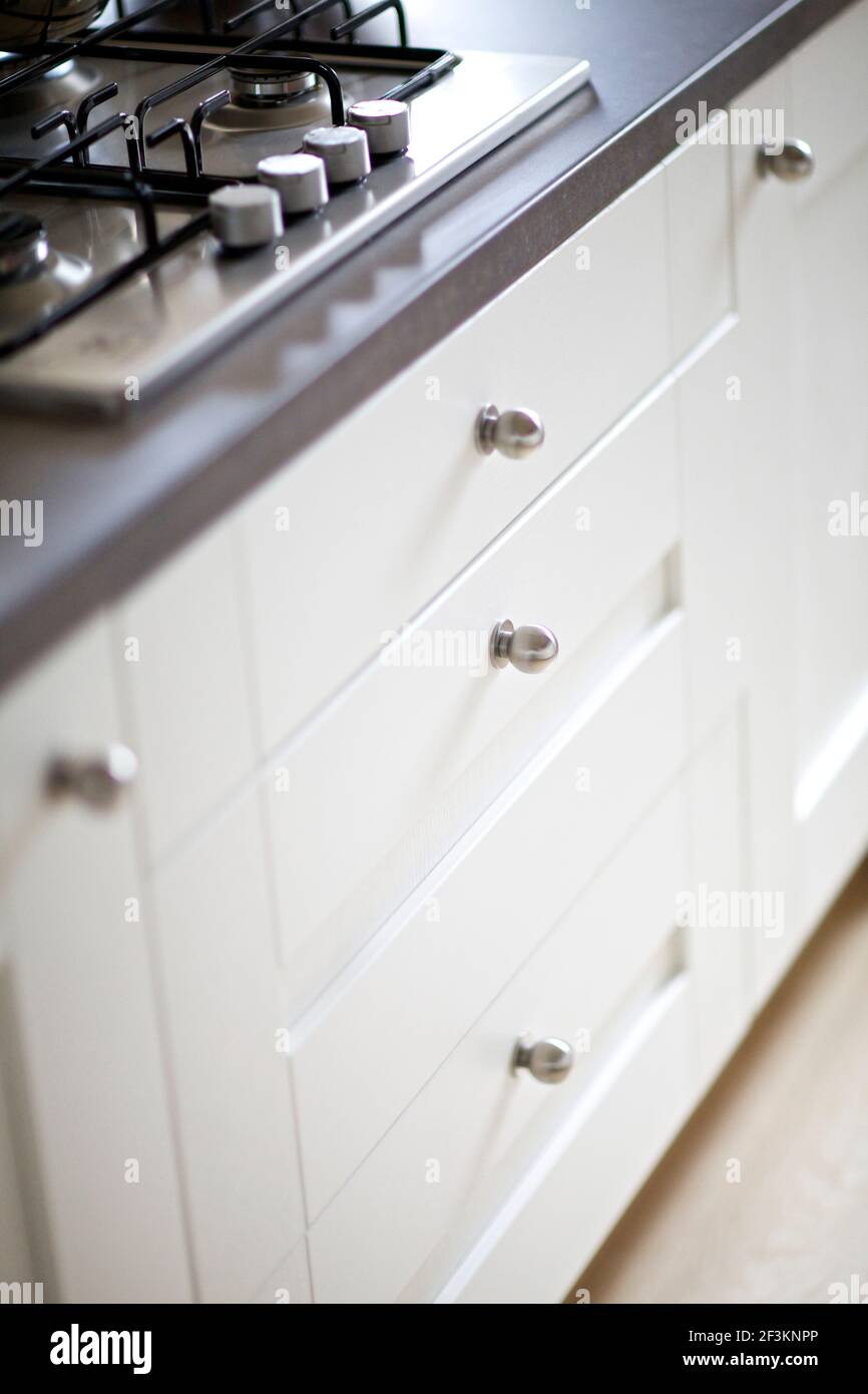 Kitchen Drawers under hob Stock Photo - Alamy