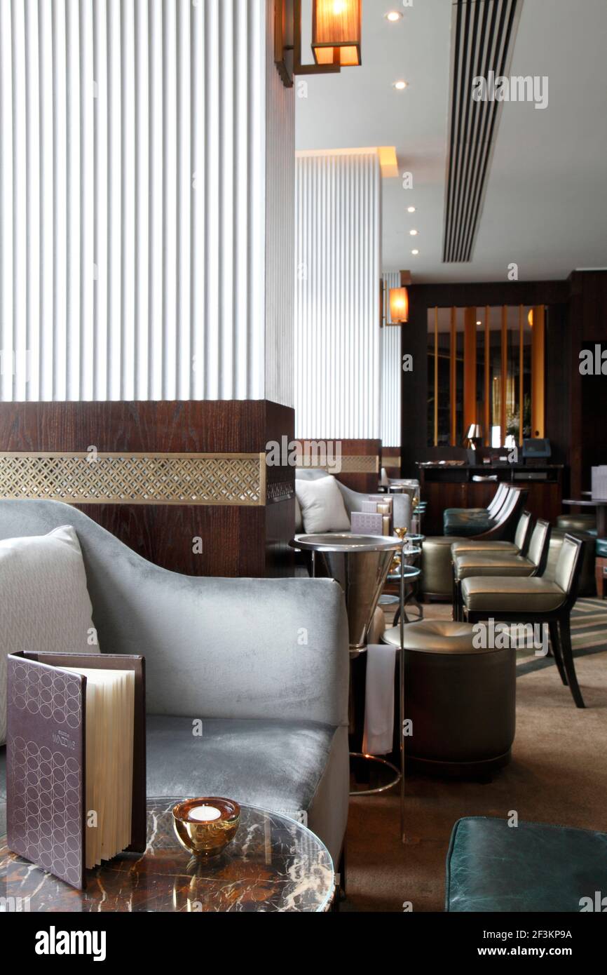 Window booth seating with fluted columns between windows | | Designer ...