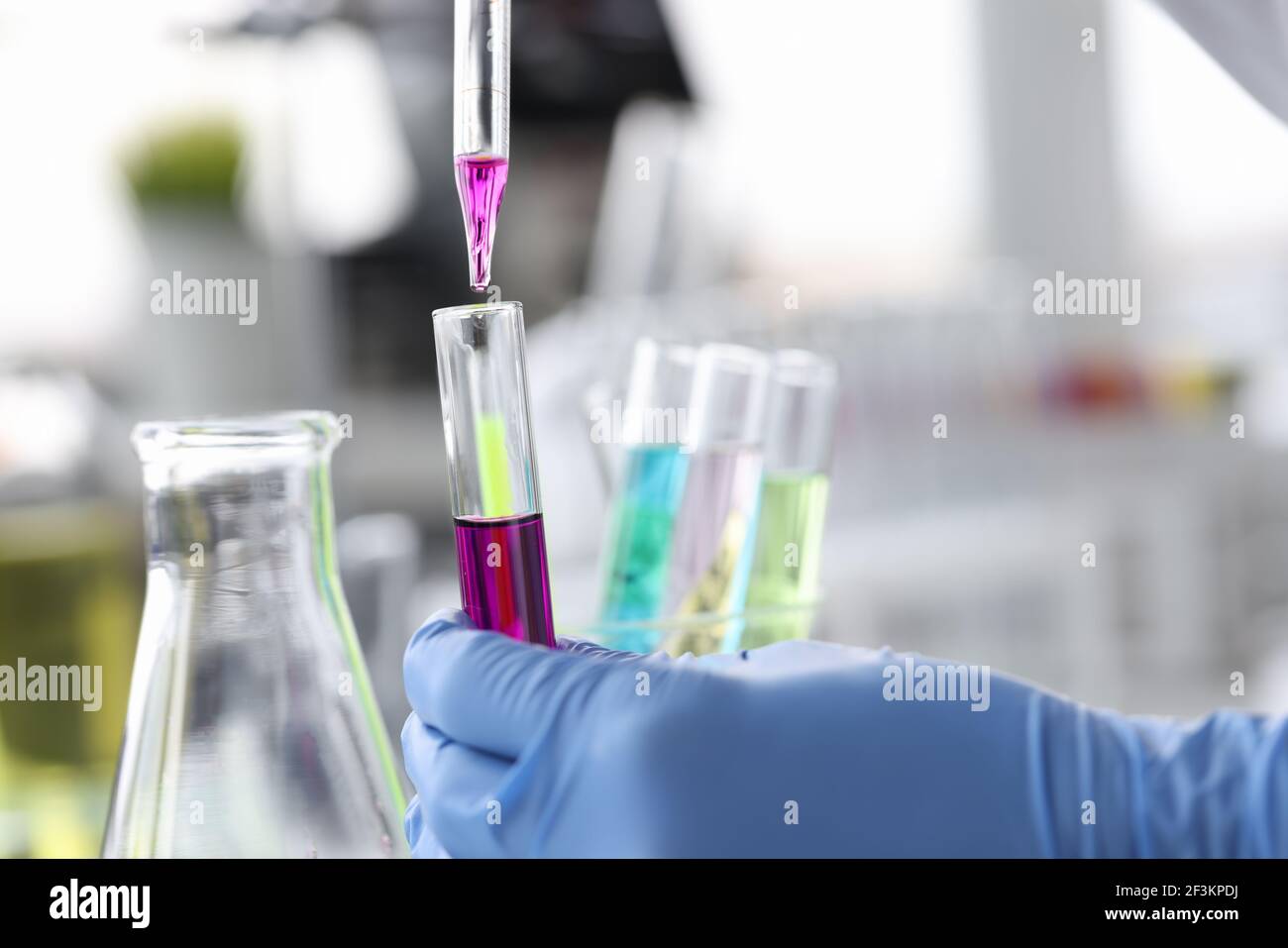 Scientist lab test tube dropper hi-res stock photography and images - Alamy