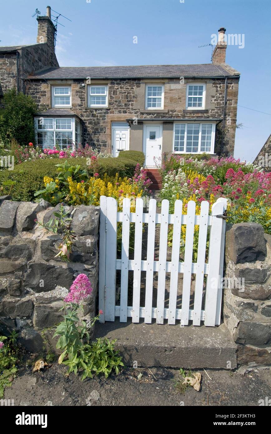 Cottage in the fishing village of Craster, Northumberland, England ...