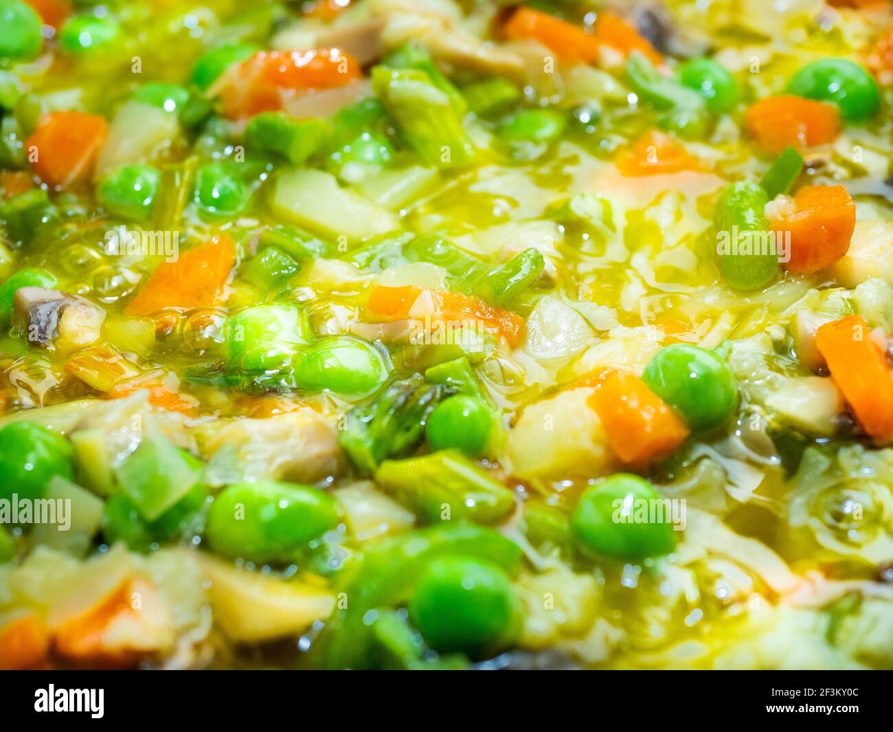 The vegetables frying in a small amount of fat Stock Photo - Alamy