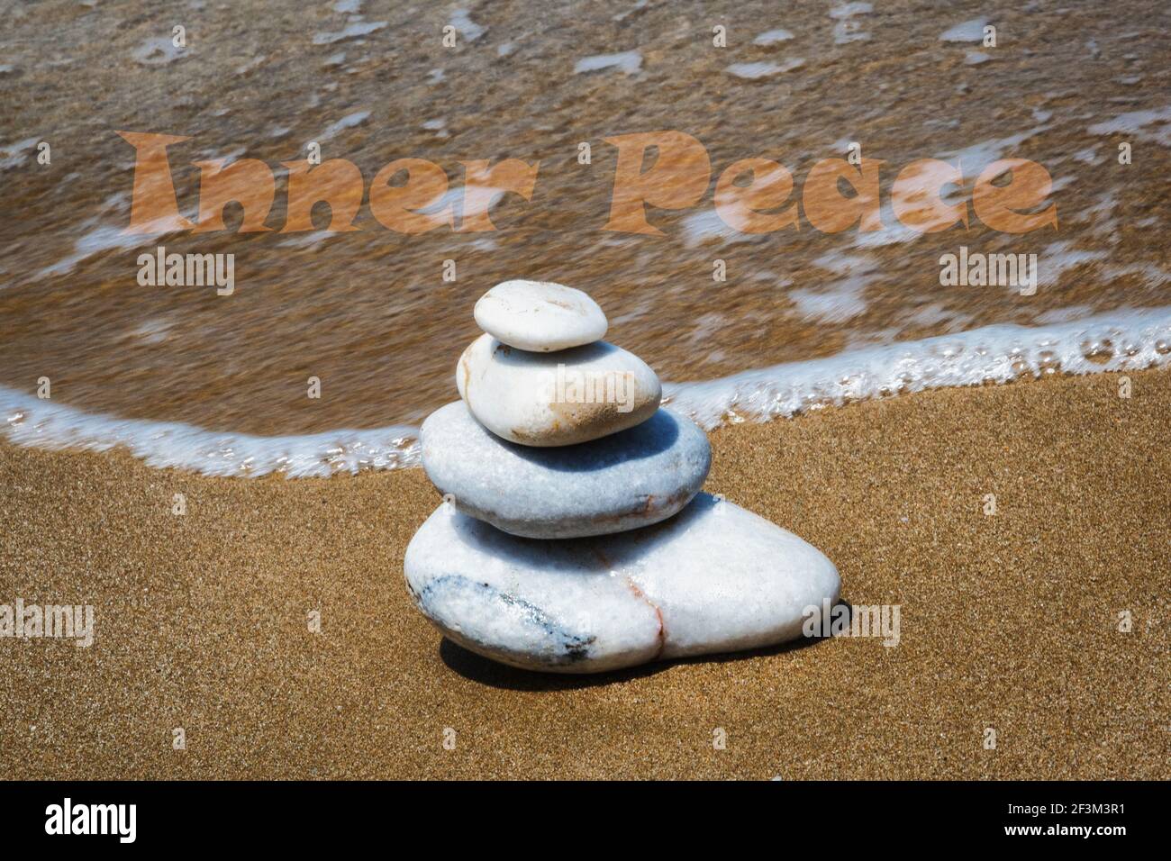 Image of balancing stones on the beach with inspirational message ...