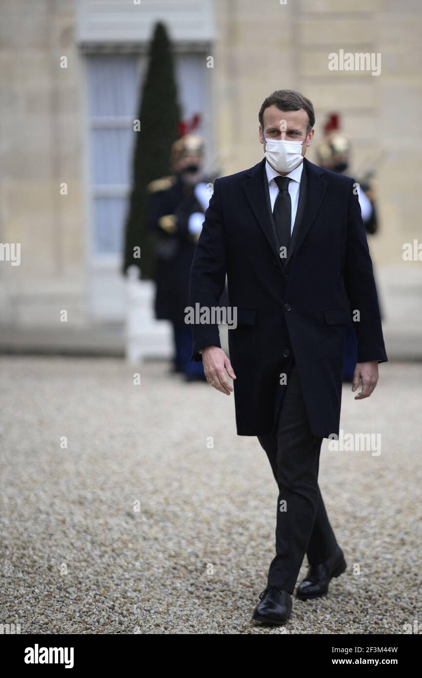French President Emmanuel Macron gestures at Elysee Palace in Paris ...