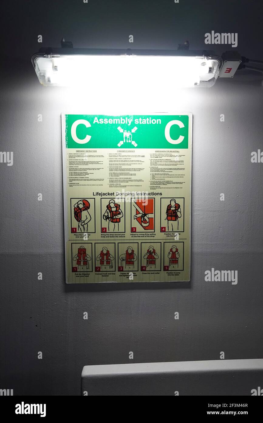 Assembly station safety sign on ferry Stock Photo - Alamy