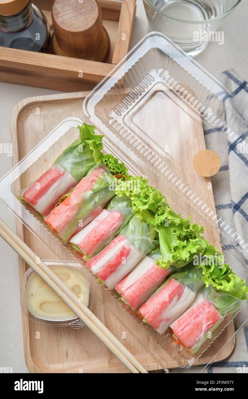 The fresh spring rolls in the plastic container Stock Photo - Alamy