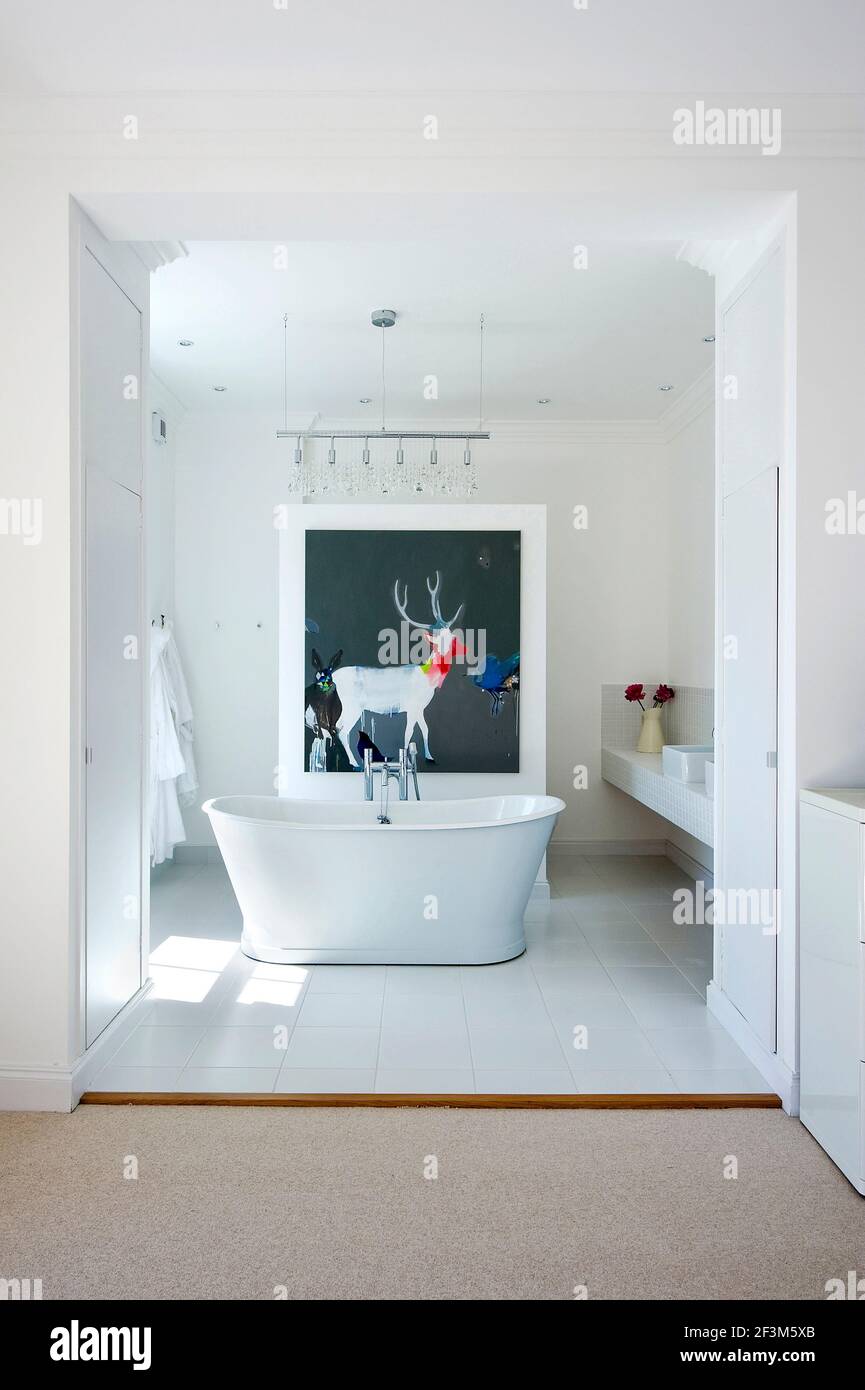 Modern white open ensuite bathroom in UK home Stock Photo - Alamy