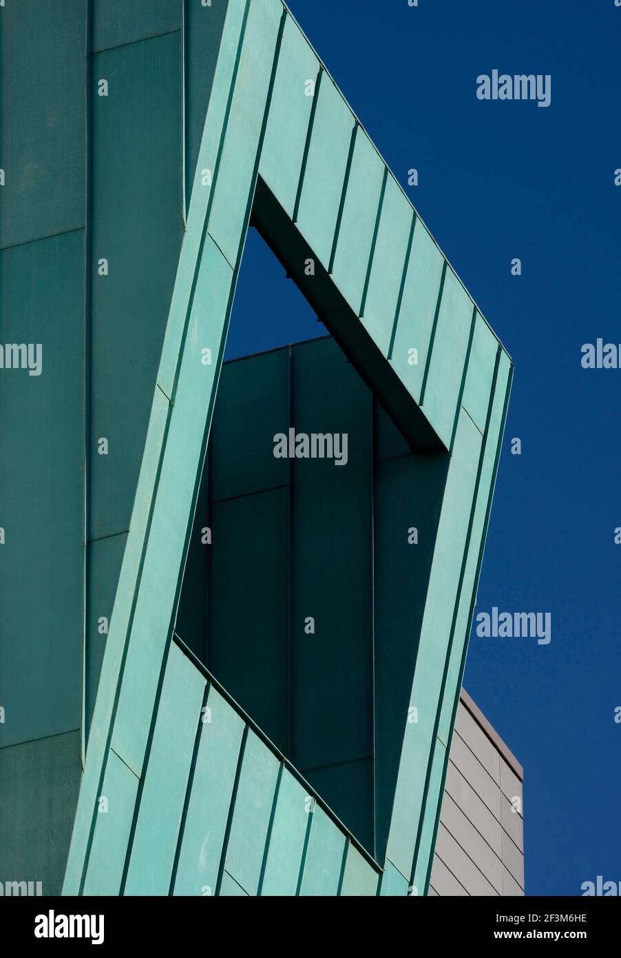 Cooper building detail with square shaped window and blue sky, UK Stock ...
