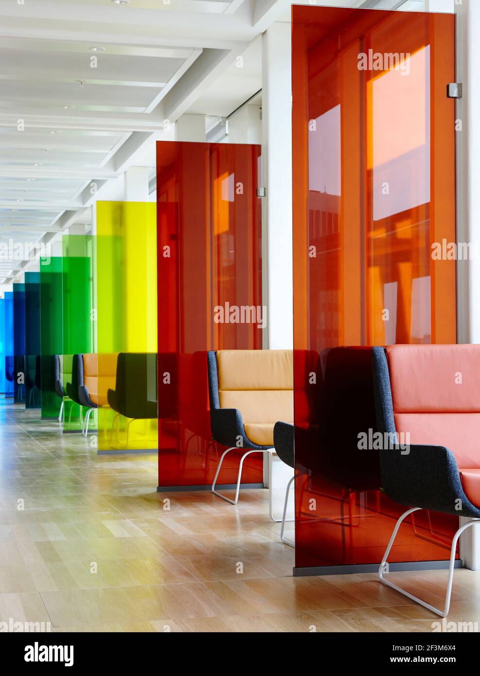 Coloured glass partitions and chairs in Co-op Head Offices, 1 Angel ...