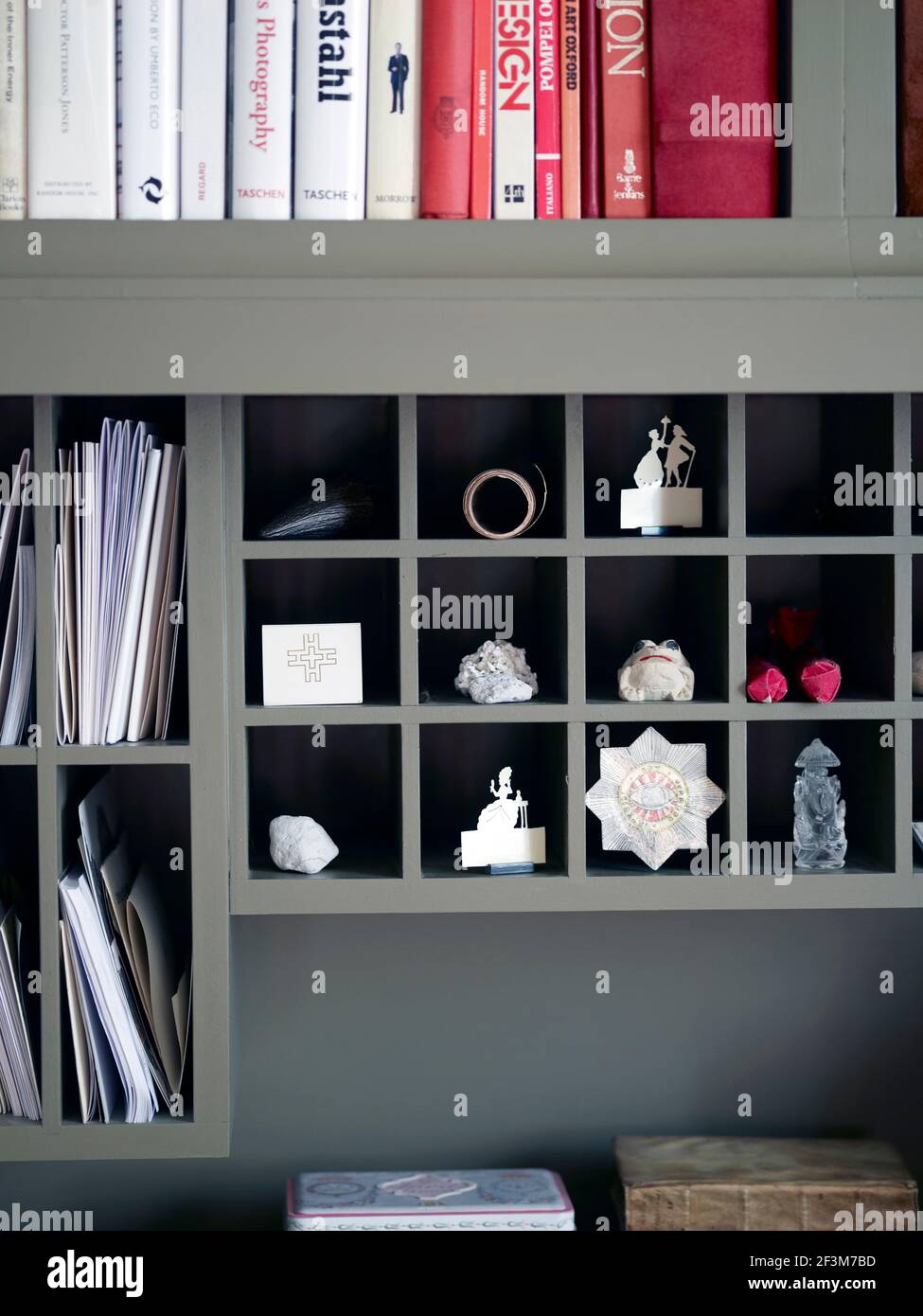 Bookshelf/display case in residential home, UK Stock Photo - Alamy