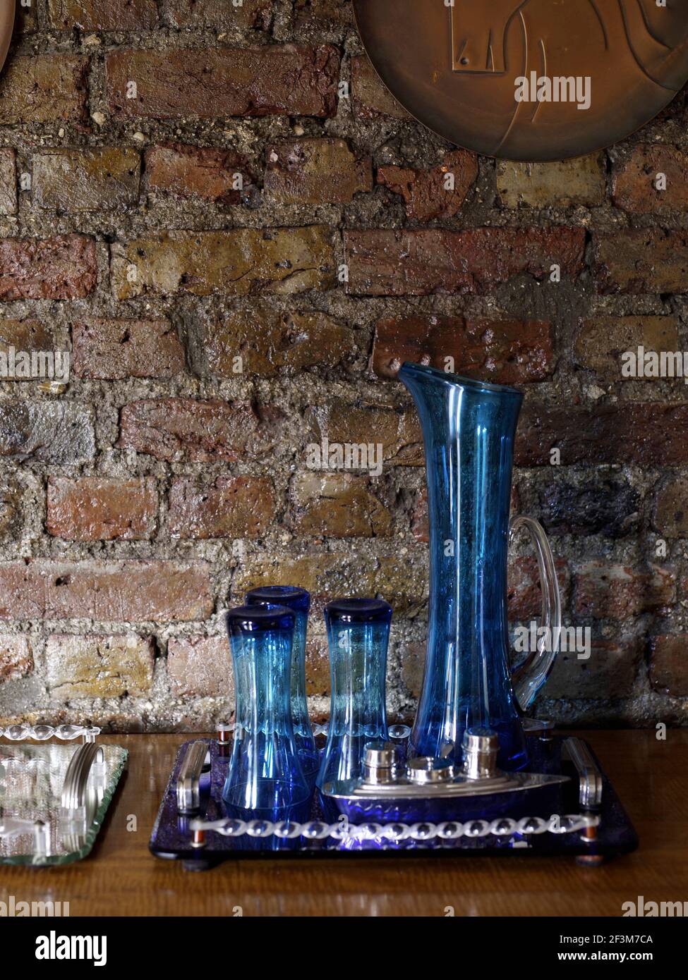Blue glassware in residential home, UK Stock Photo - Alamy