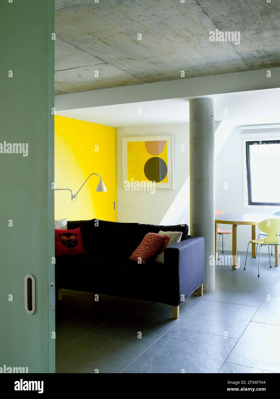Open plan room with sofa in Batemans Row home, UK Stock Photo - Alamy