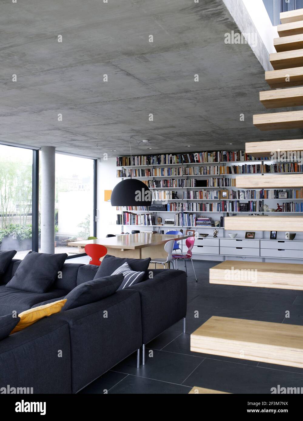Spacious open plan room with stairs in Batemans Row, London, UK Stock ...